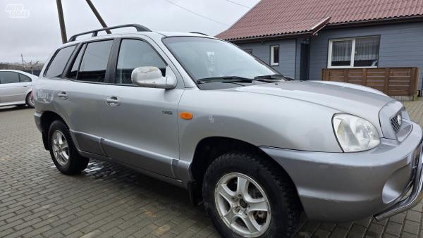 Grey Hyundai Santa Fe 2004 in Kretinga, with an engine capacity of 2.00 L and mileage of 226 thousand km for 1500 €, photo 7 on AUTOMOTO.COM.LV