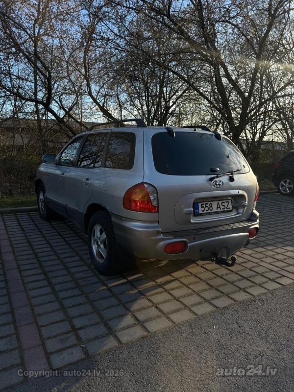 Pelēks Hyundai Santa Fe 2004 Tallina, ar dzinēja tilpumu 2.00 L un nobraukumu 339 tūkst. km par 1998 €, foto 4 vietnē AUTOMOTO.COM.LV