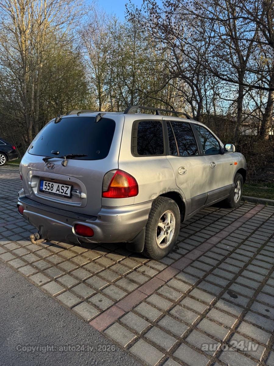 Pelēks Hyundai Santa Fe 2004 Tallina, ar dzinēja tilpumu 2.00 L un nobraukumu 339 tūkst. km par 1998 €, foto 7 vietnē AUTOMOTO.COM.LV