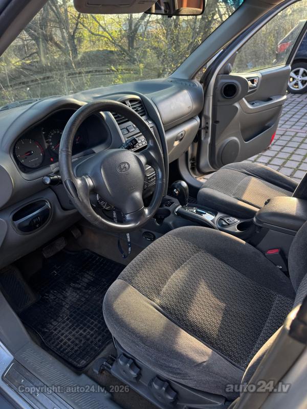 Pelēks Hyundai Santa Fe 2004 Tallina, ar dzinēja tilpumu 2.00 L un nobraukumu 339 tūkst. km par 1998 €, foto 8 vietnē AUTOMOTO.COM.LV