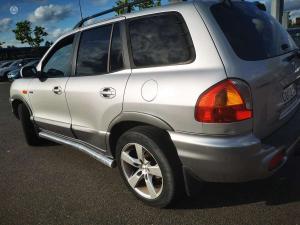 Pelēks Hyundai Santa Fe 2004 Viļņa, ar dzinēja tilpumu 1.99 L un nobraukumu 269 tūkst. km par 2850 €, foto  vietnē AUTOMOTO.COM.LV