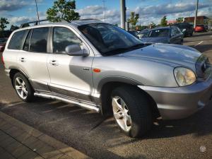 Grey Hyundai Santa Fe 2004 in Vilnius, with an engine capacity of 1.99 L and mileage of 269 thousand km for 2850 €, photo 9 on AUTOMOTO.COM.LV