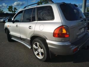 Grey Hyundai Santa Fe 2004 in Vilnius, with an engine capacity of 1.99 L and mileage of 269 thousand km for 2850 €, photo 11 on AUTOMOTO.COM.LV