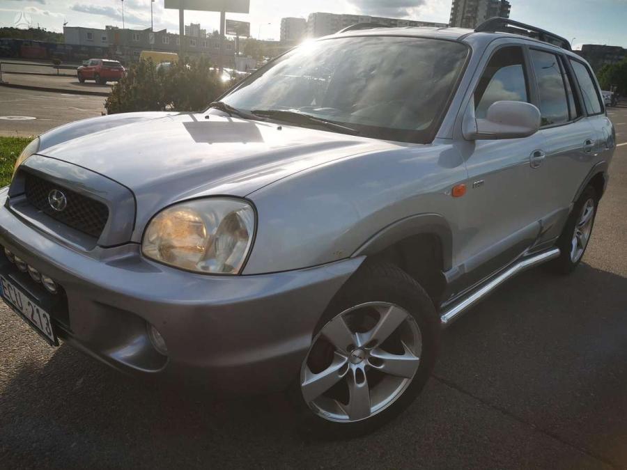 Grey Hyundai Santa Fe 2004 in Vilnius, with an engine capacity of 1.99 L and mileage of 269 thousand km for 2850 €, photo 12 on AUTOMOTO.COM.LV