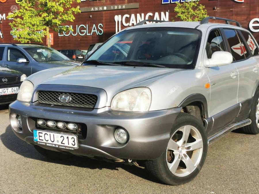 Grey Hyundai Santa Fe 2004 in Vilnius, with an engine capacity of 1.99 L and mileage of 269 thousand km for 2850 €, photo 15 on AUTOMOTO.COM.LV