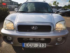 Grey Hyundai Santa Fe 2004 in Vilnius, with an engine capacity of 1.99 L and mileage of 269 thousand km for 2850 €, photo 24 on AUTOMOTO.COM.LV