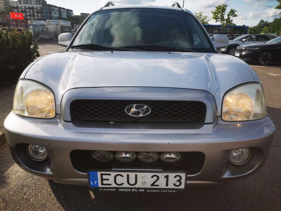 Grey Hyundai Santa Fe 2004 in Vilnius, with an engine capacity of 1.99 L and mileage of 269 thousand km for 2850 €, photo 24 on AUTOMOTO.COM.LV