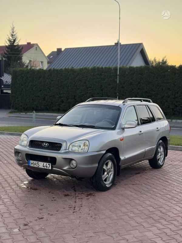 Pelēks Hyundai Santa Fe 2005 Viļņa, ar dzinēja tilpumu 2.35 L un nobraukumu 143 tūkst. km par 1000 €, foto 2 vietnē AUTOMOTO.COM.LV
