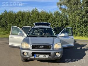 Pelēks Hyundai Santa Fe 2005 Rīga, ar dzinēja tilpumu 2.40 L un nobraukumu 282 tūkst. km par 2300 €, foto 3 vietnē AUTOMOTO.COM.LV