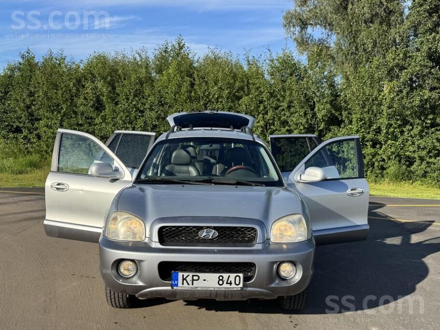 Pelēks Hyundai Santa Fe 2005 Rīga, ar dzinēja tilpumu 2.40 L un nobraukumu 282 tūkst. km par 2300 €, foto 3 vietnē AUTOMOTO.COM.LV