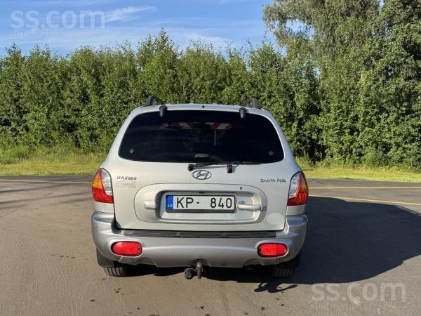 Pelēks Hyundai Santa Fe 2005 Rīga, ar dzinēja tilpumu 2.40 L un nobraukumu 282 tūkst. km par 2300 €, foto 6 vietnē AUTOMOTO.COM.LV