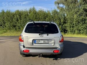 Pelēks Hyundai Santa Fe 2005 Rīga, ar dzinēja tilpumu 2.40 L un nobraukumu 282 tūkst. km par 2300 €, foto 6 vietnē AUTOMOTO.COM.LV