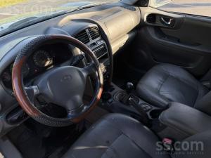 Pelēks Hyundai Santa Fe 2005 Rīga, ar dzinēja tilpumu 2.40 L un nobraukumu 282 tūkst. km par 2300 €, foto 9 vietnē AUTOMOTO.COM.LV