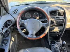 Pelēks Hyundai Santa Fe 2005 Rīga, ar dzinēja tilpumu 2.40 L un nobraukumu 282 tūkst. km par 2300 €, foto 10 vietnē AUTOMOTO.COM.LV