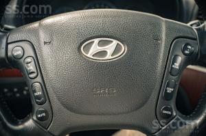 Grey Hyundai Santa Fe 2007 in Riga, with an engine capacity of 2.20 L and mileage of 294 thousand km for 2990 €, photo 21 on AUTOMOTO.COM.LV