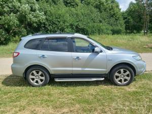 Pelēks Hyundai Santa Fe 2008 Rīga, ar dzinēja tilpumu 2.20 L un nobraukumu 250 tūkst. km par 4800 €, foto 5 vietnē AUTOMOTO.COM.LV