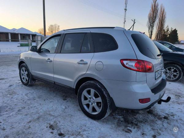 Pelēks Hyundai Santa Fe 2009 Tauragė, ar dzinēja tilpumu 2.19 L un nobraukumu 268 tūkst. km par 4600 €, foto 6 vietnē AUTOMOTO.COM.LV