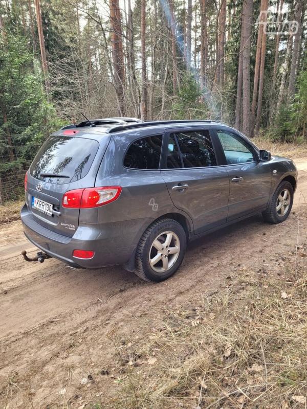 Grey Hyundai Santa Fe 2009 in Vilnius, with an engine capacity of 2.20 L and mileage of 236 thousand km for 4550 €, photo 7 on AUTOMOTO.COM.LV