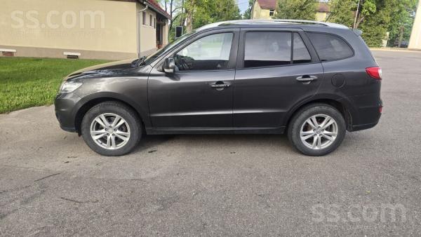 Pelēks Hyundai Santa Fe 2011 Rīga, ar dzinēja tilpumu 2.20 L un nobraukumu 250 tūkst. km par 5999 €, foto 8 vietnē AUTOMOTO.COM.LV