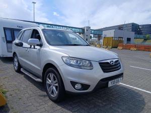 Grey Hyundai Santa Fe 2011 in Silute, with an engine capacity of 2.20 L and mileage of 153 thousand km for 2600 €, photo 5 on AUTOMOTO.COM.LV