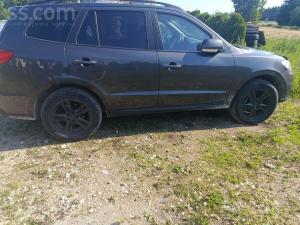 Pelēks Hyundai Santa Fe 2011 Rīga, ar dzinēja tilpumu 2.40 L un nobraukumu 276 tūkst. km par 5000 €, foto 5 vietnē AUTOMOTO.COM.LV