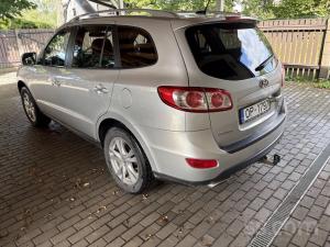Pelēks Hyundai Santa Fe 2011 Rīga, ar dzinēja tilpumu 2.20 L un nobraukumu 188 tūkst. km par 6700 €, foto 3 vietnē AUTOMOTO.COM.LV