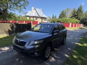Pelēks Hyundai Santa Fe 2011 Kauņa, ar dzinēja tilpumu 2.20 L un nobraukumu 248 tūkst. km par 6750 €, foto  vietnē AUTOMOTO.COM.LV