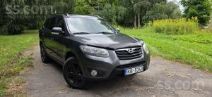 Pelēks Hyundai Santa Fe 2011 Rīga, ar dzinēja tilpumu 2.40 L un nobraukumu 275 tūkst. km par 4100 €, foto 3 vietnē AUTOMOTO.COM.LV
