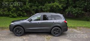 Pelēks Hyundai Santa Fe 2011 Rīga, ar dzinēja tilpumu 2.40 L un nobraukumu 275 tūkst. km par 4100 €, foto 6 vietnē AUTOMOTO.COM.LV