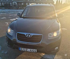 Pelēks Hyundai Santa Fe 2011 Viļņa, ar dzinēja tilpumu 2.20 L un nobraukumu 592 tūkst. km par 4300 €, foto  vietnē AUTOMOTO.COM.LV