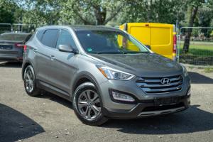 Grey Hyundai Santa Fe 2012 in Riga, with an engine capacity of 2.40 L and mileage of 146 thousand km for 11200 €, photo 5 on AUTOMOTO.COM.LV