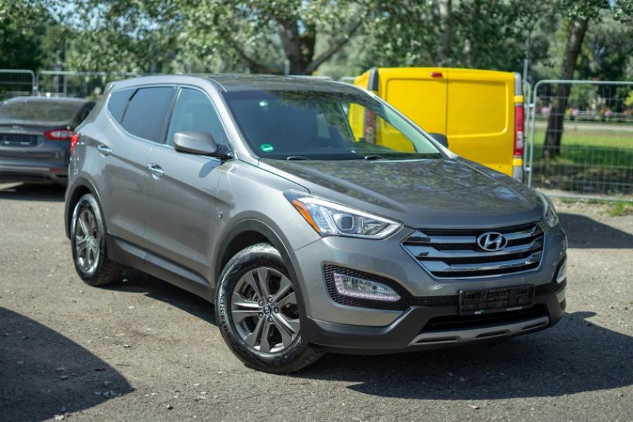 Grey Hyundai Santa Fe 2012 in Riga, with an engine capacity of 2.40 L and mileage of 146 thousand km for 11200 €, photo 5 on AUTOMOTO.COM.LV