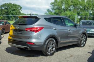 Grey Hyundai Santa Fe 2012 in Riga, with an engine capacity of 2.40 L and mileage of 146 thousand km for 11200 €, photo 8 on AUTOMOTO.COM.LV