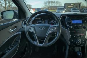 Grey Hyundai Santa Fe 2012 in Riga, with an engine capacity of 2.40 L and mileage of 146 thousand km for 11200 €, photo 14 on AUTOMOTO.COM.LV