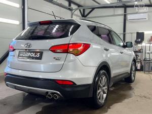 Grey Hyundai Santa Fe 2012 in Aukstieji Rusokai, with an engine capacity of 2.20 L and mileage of 225 thousand km for 9900 €, photo 12 on AUTOMOTO.COM.LV