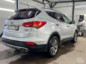 Grey Hyundai Santa Fe 2012 in Aukstieji Rusokai, with an engine capacity of 2.20 L and mileage of 225 thousand km for 9900 €, photo 14 on AUTOMOTO.COM.LV