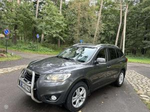 Pelēks Hyundai Santa Fe 2012 Kauņa, ar dzinēja tilpumu 2.20 L un nobraukumu 196 tūkst. km par 6350 €, foto  vietnē AUTOMOTO.COM.LV