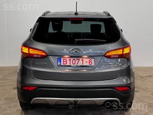 Grey Hyundai Santa Fe 2013 in Jurmala, with an engine capacity of 2.40 L and mileage of 197 thousand km for 11450 €, photo 12 on AUTOMOTO.COM.LV