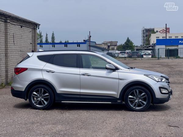 Pelēks Hyundai Santa Fe 2013 Kretinga, ar dzinēja tilpumu 2.00 L un nobraukumu 180 tūkst. km par 8500 €, foto 4 vietnē AUTOMOTO.COM.LV