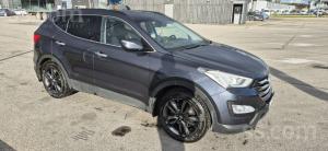 Pelēks Hyundai Santa Fe 2013 Rīga, ar dzinēja tilpumu 2.20 L un nobraukumu 280 tūkst. km par 10500 €, foto  vietnē AUTOMOTO.COM.LV