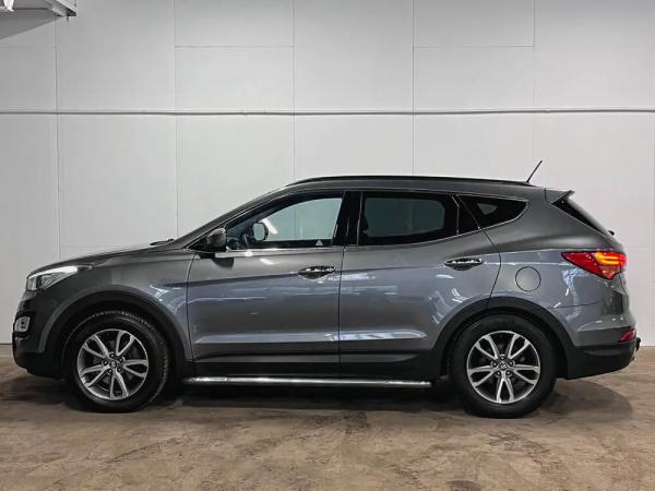 Grey Hyundai Santa Fe 2013 in Jurmala, with an engine capacity of 2.40 L and mileage of 198 thousand km for 11750 €, photo 4 on AUTOMOTO.COM.LV