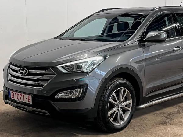 Grey Hyundai Santa Fe 2013 in Jurmala, with an engine capacity of 2.40 L and mileage of 198 thousand km for 11750 €, photo 5 on AUTOMOTO.COM.LV