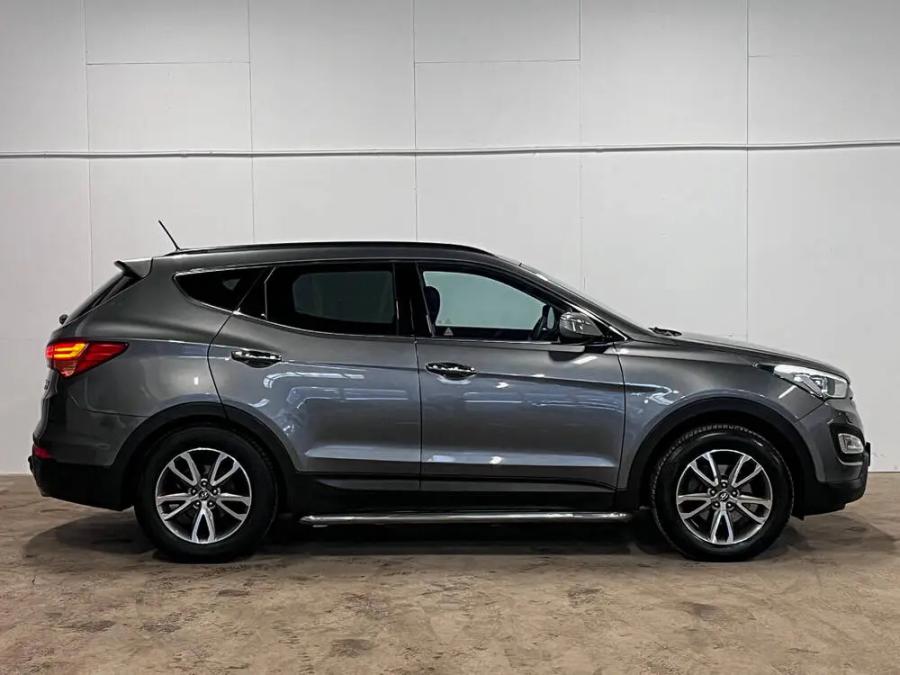 Grey Hyundai Santa Fe 2013 in Jurmala, with an engine capacity of 2.40 L and mileage of 198 thousand km for 11750 €, photo 8 on AUTOMOTO.COM.LV