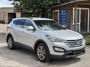 Grey Hyundai Santa Fe 2013 in Utena, with an engine capacity of 2.20 L and mileage of 196 thousand km for 7850 €, photo 4 on AUTOMOTO.COM.LV