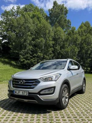 Pelēks Hyundai Santa Fe 2013 Viļņa, ar dzinēja tilpumu 2.20 L un nobraukumu 281 tūkst. km par 8300 €, foto  vietnē AUTOMOTO.COM.LV