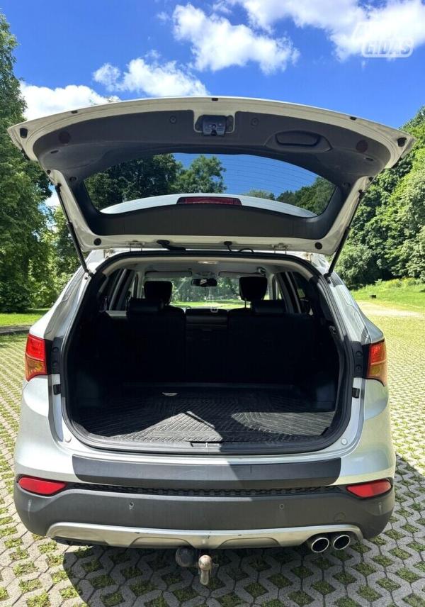 Pelēks Hyundai Santa Fe 2013 Viļņa, ar dzinēja tilpumu 2.20 L un nobraukumu 281 tūkst. km par 8300 €, foto 6 vietnē AUTOMOTO.COM.LV