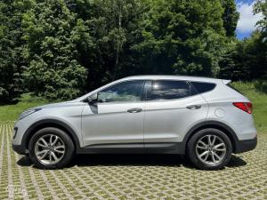 Grey Hyundai Santa Fe 2013 in Vilnius, with an engine capacity of 2.20 L and mileage of 281 thousand km for 8300 €, photo 6 on AUTOMOTO.COM.LV