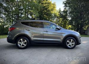 Pelēks Hyundai Santa Fe 2013 Jūrmala, ar dzinēja tilpumu 2.20 L un nobraukumu 168 tūkst. km par 9995 €, foto 7 vietnē AUTOMOTO.COM.LV