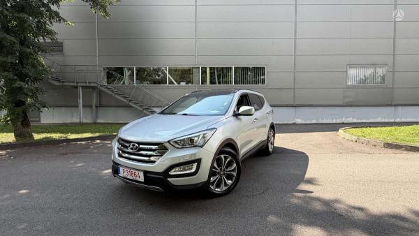 Grey Hyundai Santa Fe 2013 in Alytus, with an engine capacity of 2.19 L and mileage of 247 thousand km for 9750 €, photo 3 on AUTOMOTO.COM.LV