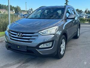 Grey Hyundai Santa Fe 2013 in Utena, with an engine capacity of 2.20 L and mileage of 241 thousand km for 8950 €, photo  on AUTOMOTO.COM.LV